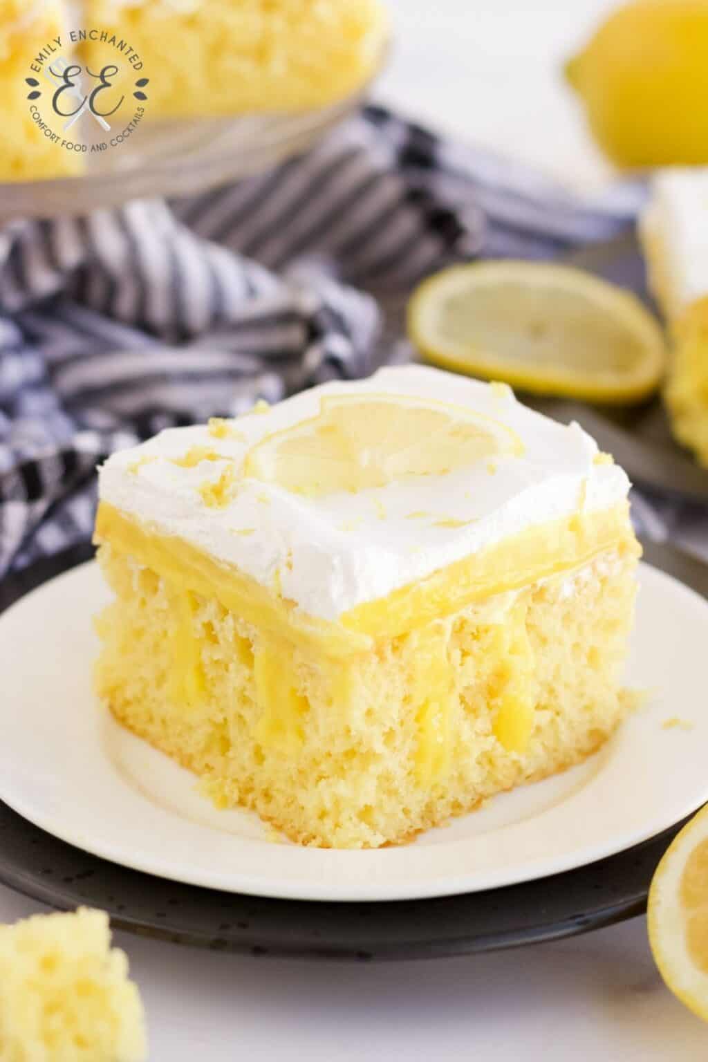 Easy Lemon Poke Cake with Lemon Pudding and Whipped Cream