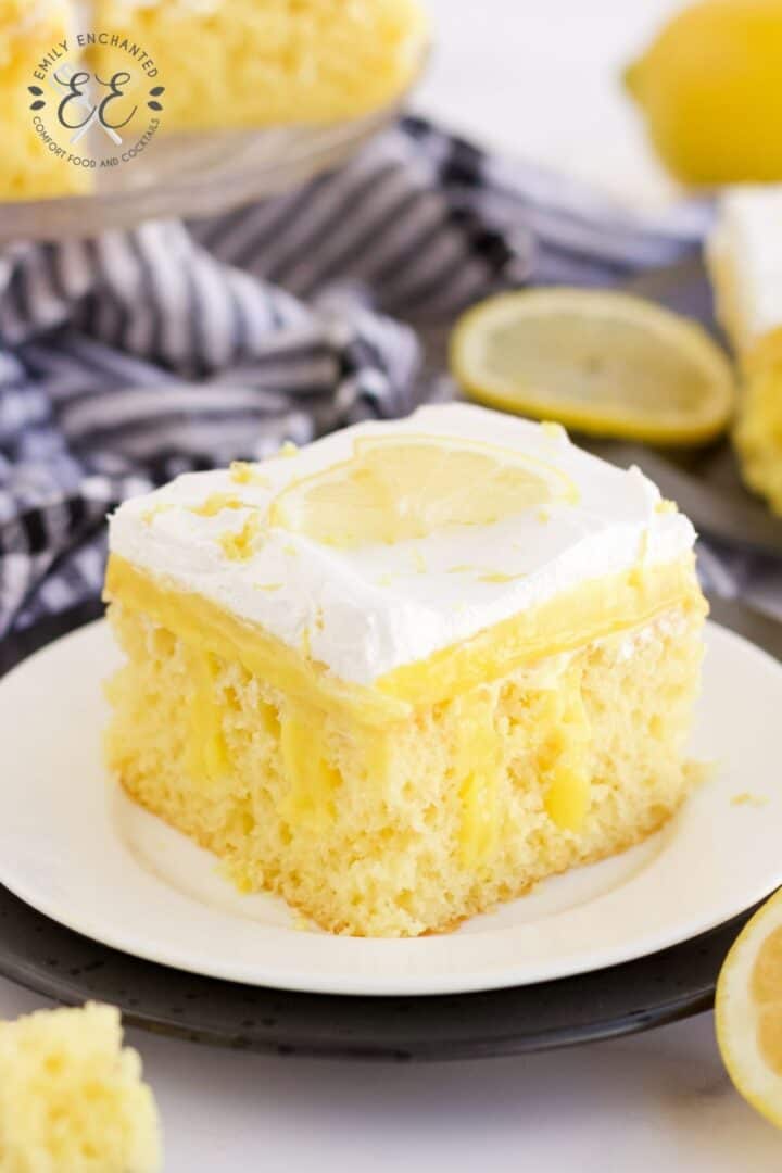 Easy Lemon Poke Cake with Lemon Pudding and Whipped Cream