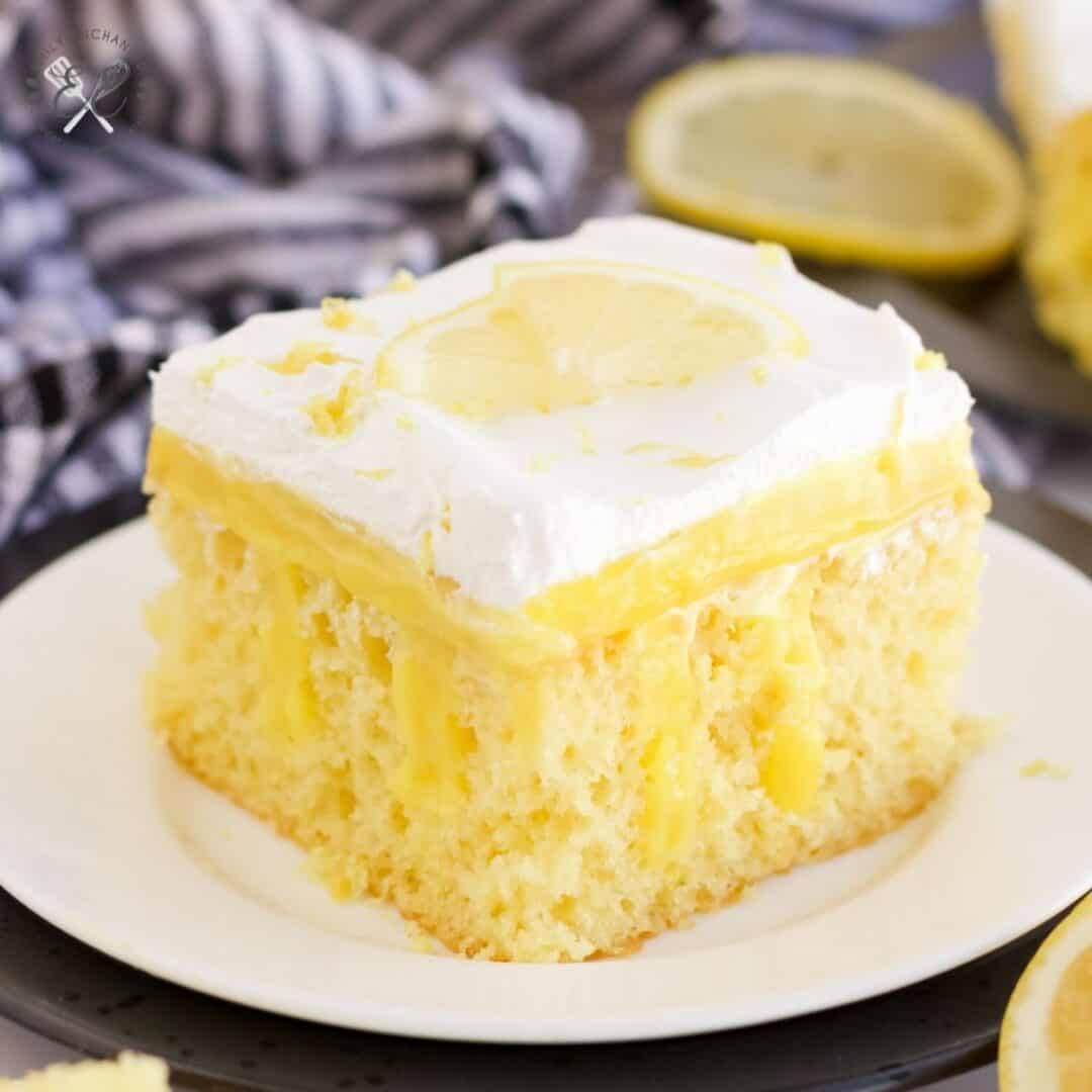 Easy Lemon Poke Cake with Lemon Pudding and Whipped Cream